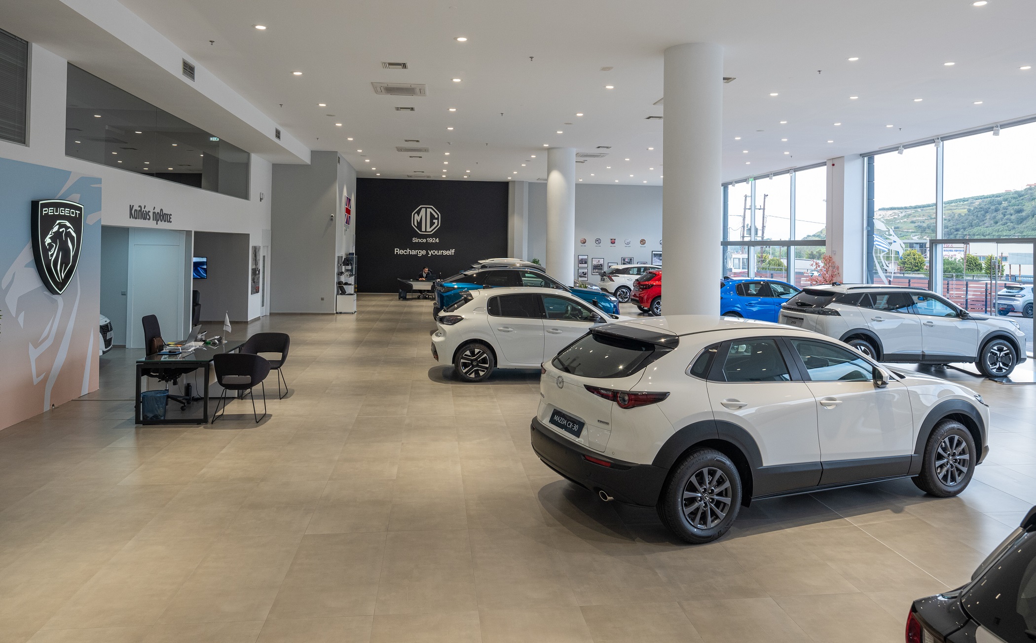 Peugeot, Mazda και MG στο νέο showroom της "Τηλέμαχος Α.Ε ...
